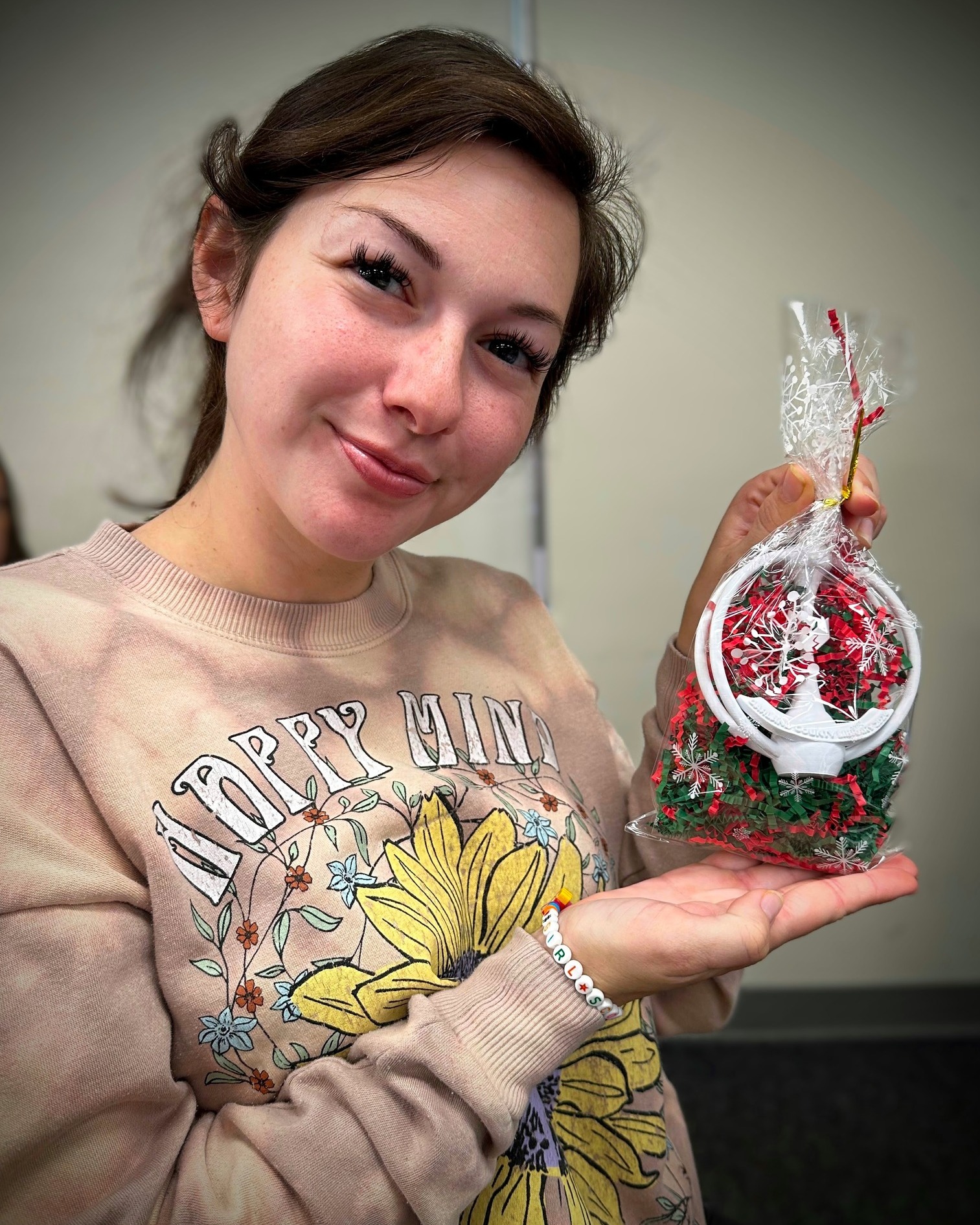 Our newest Youth Services Assistant, Courtney, helped model something ...